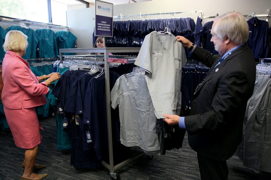 AU Health cuts ribbon at first onsite uniform store – Jagwire